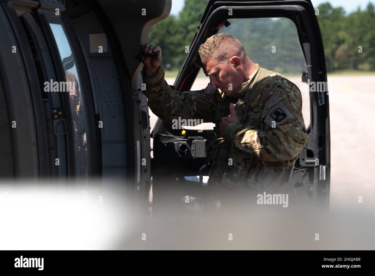A U. S. Army crew chief with Charlie Company 5-159th General Support ...