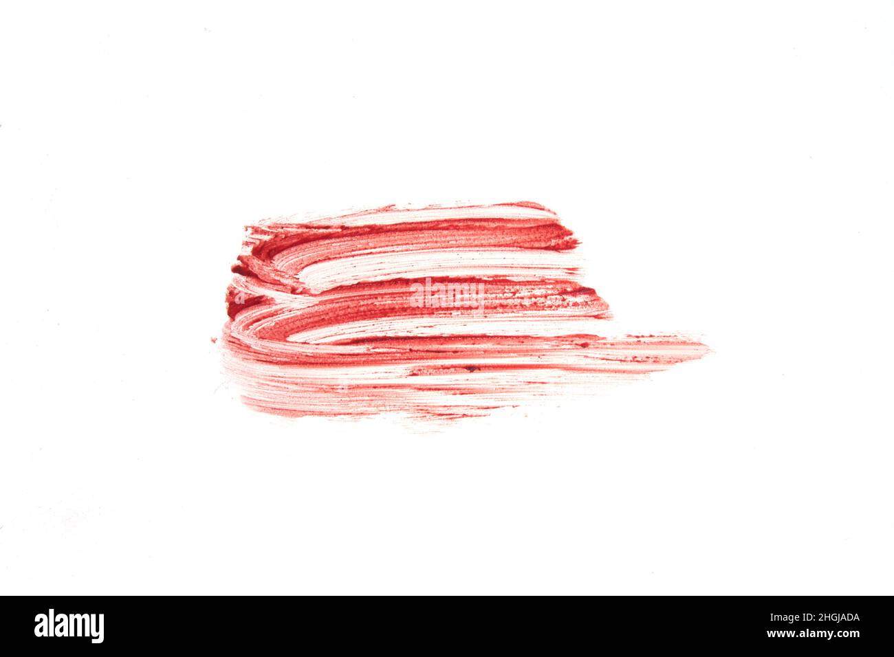 The smear and texture of lipstick. The pink color is highlighted on an ...