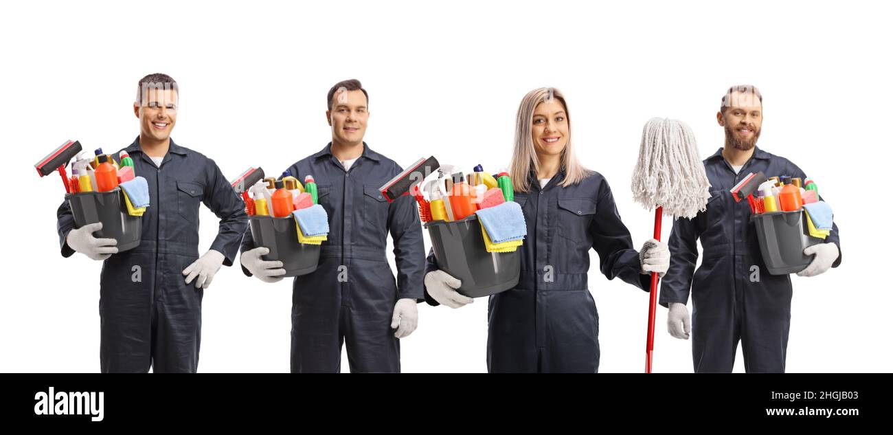 Three male and one female cleaner holding buckets with cleaning ...