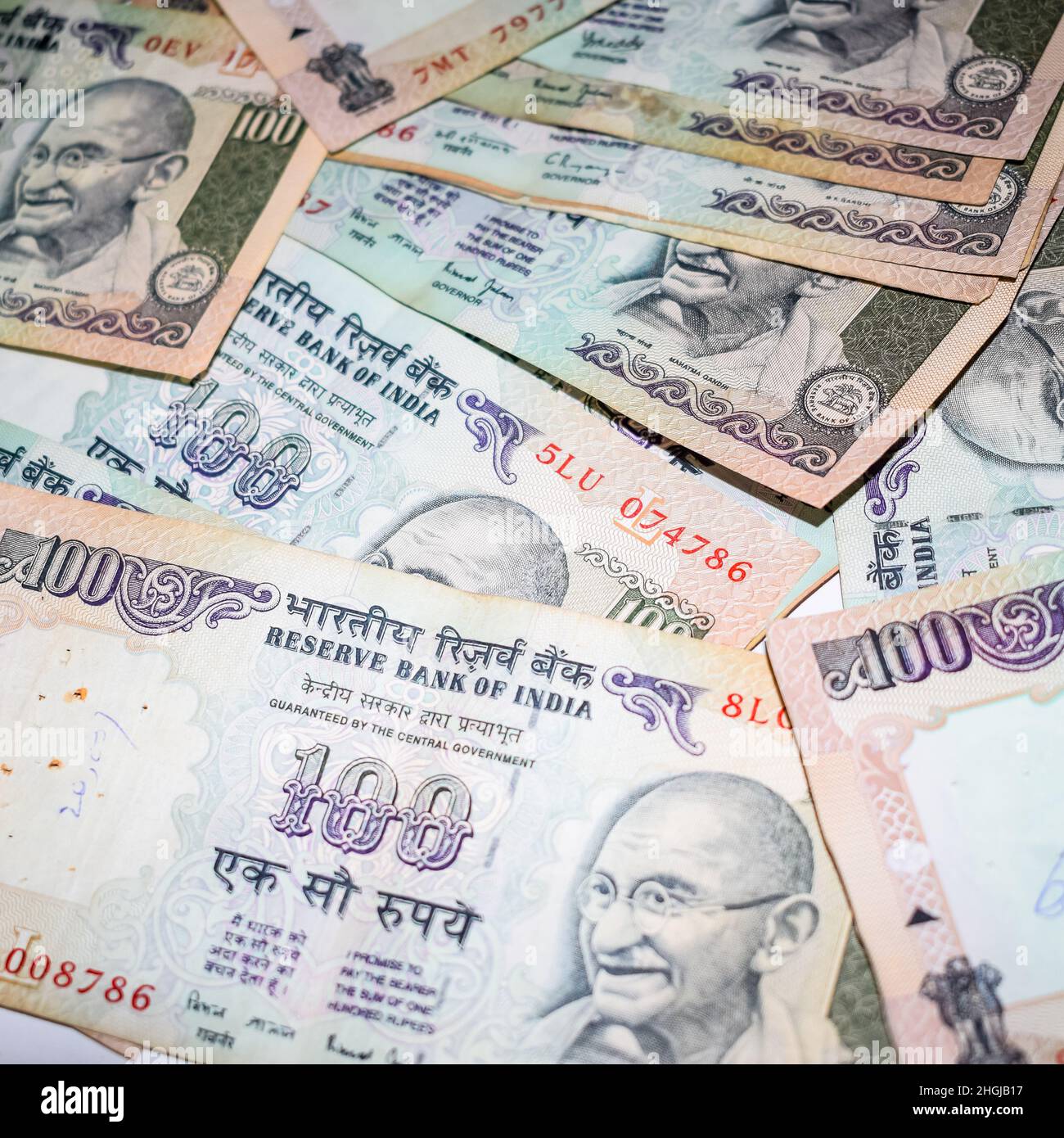 Old One Hundred Rupee notes combined on the table, India money on the ...