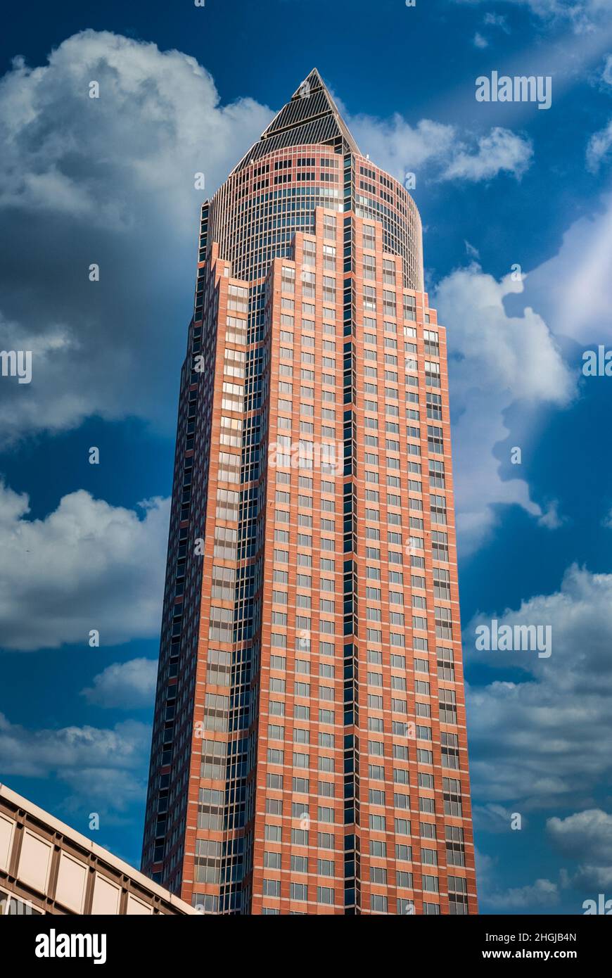 Fair Tower Frankfurt during daylight with sunbeam, view from low angle ...