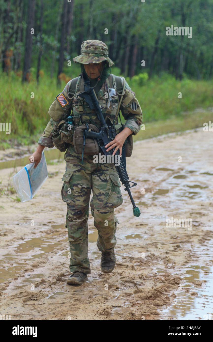 Spc. Lauren Coward, an Expert Infantry Badge candidate assigned to 1st ...