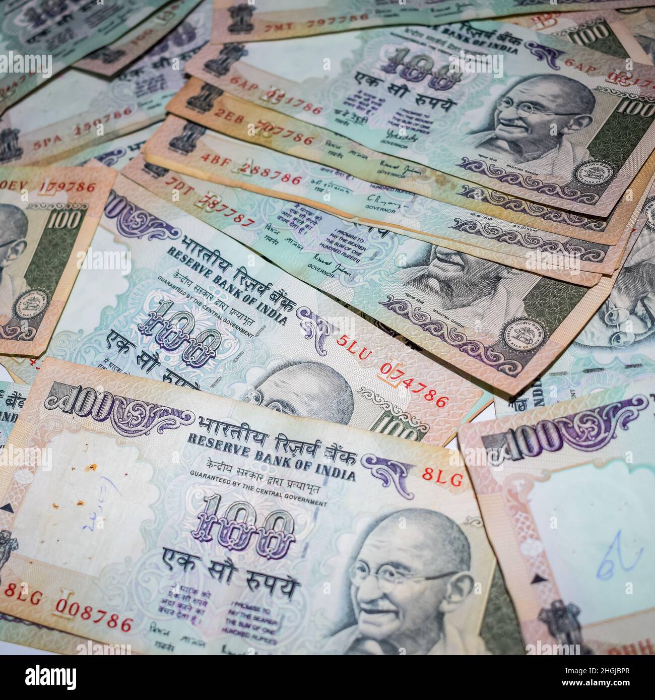 Old One Hundred Rupee notes combined on the table, India money on the ...