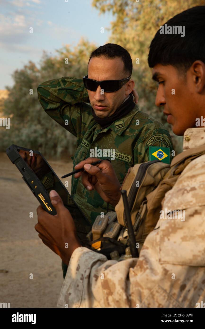 Lt. Cmdr. Fernando Bellard, left, executive officer, 2nd Infantry ...