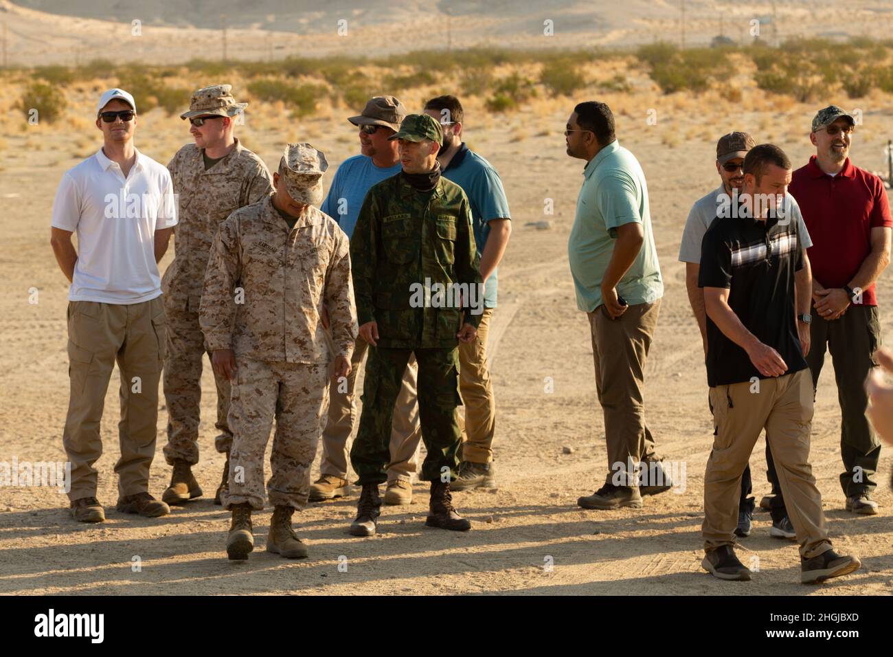 Lt. Cmdr. Fernando Bellard, center, executive officer, 2nd Infantry ...