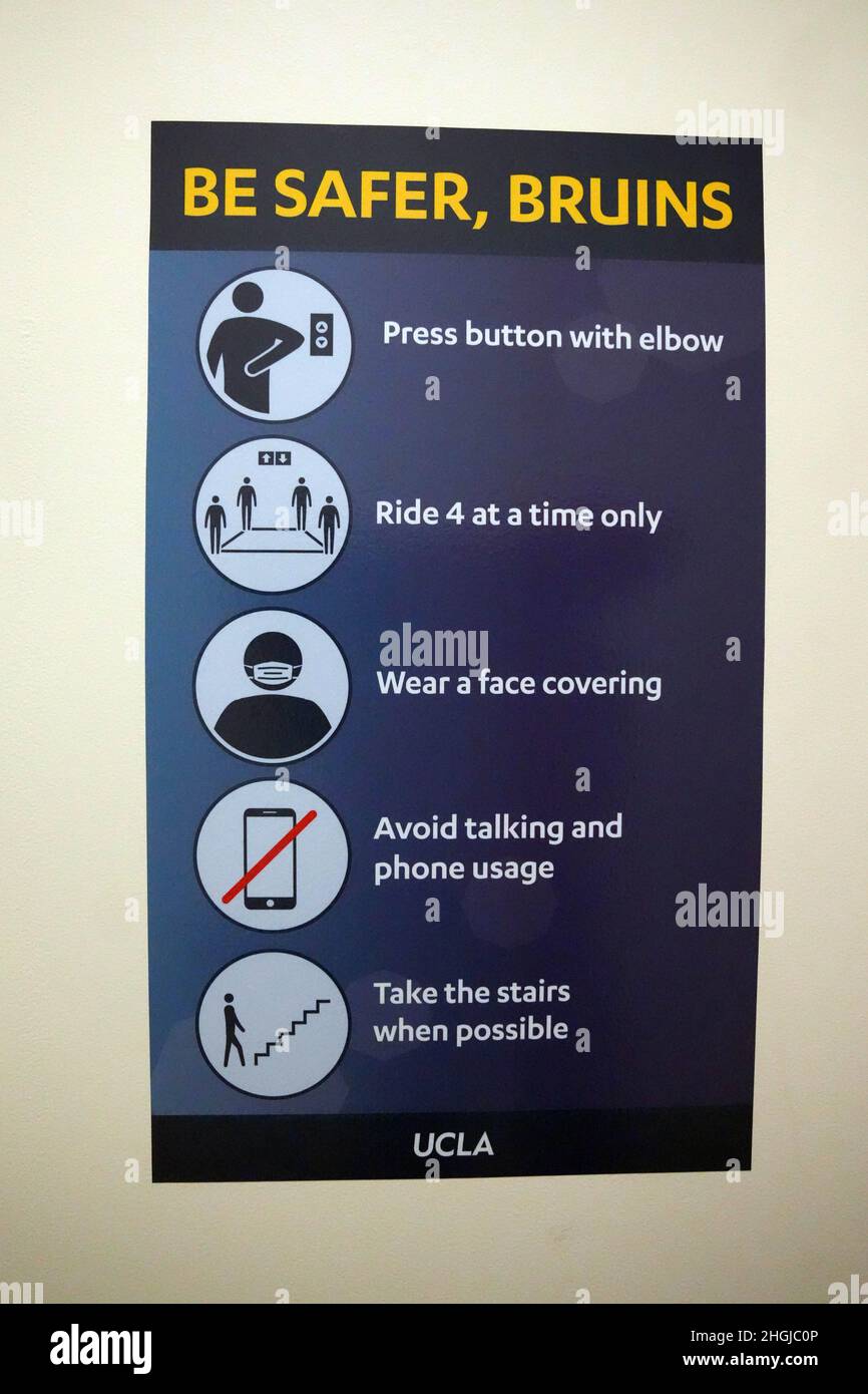 A coronavirus COVID-19 health advisory sign is seen at Pauley Pavilion ...