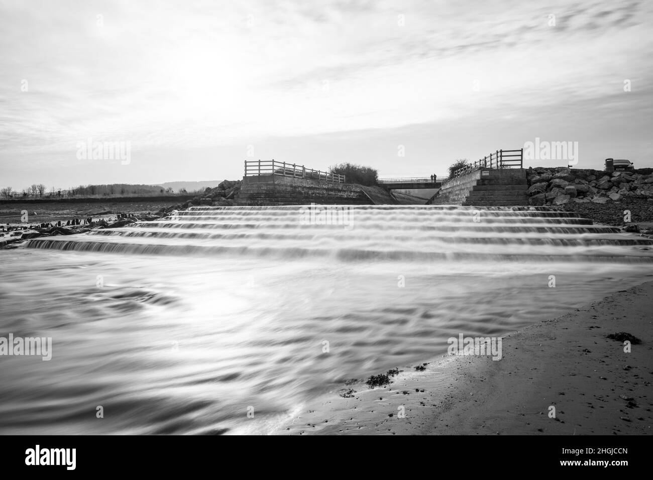 Long exposure of the waterfall from the river Avill flowing onto ...