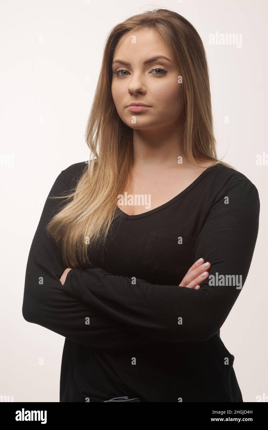 Portrait of white caucasian woman angry disappointed furious in white ...