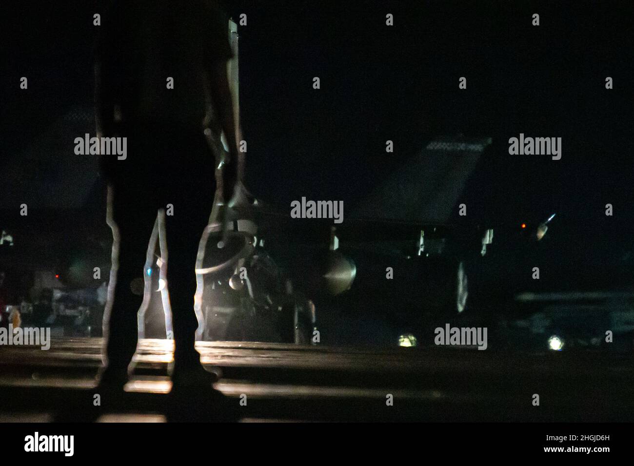 An Airman assigned to the 55th Fighter Squadron engages in flightline ...