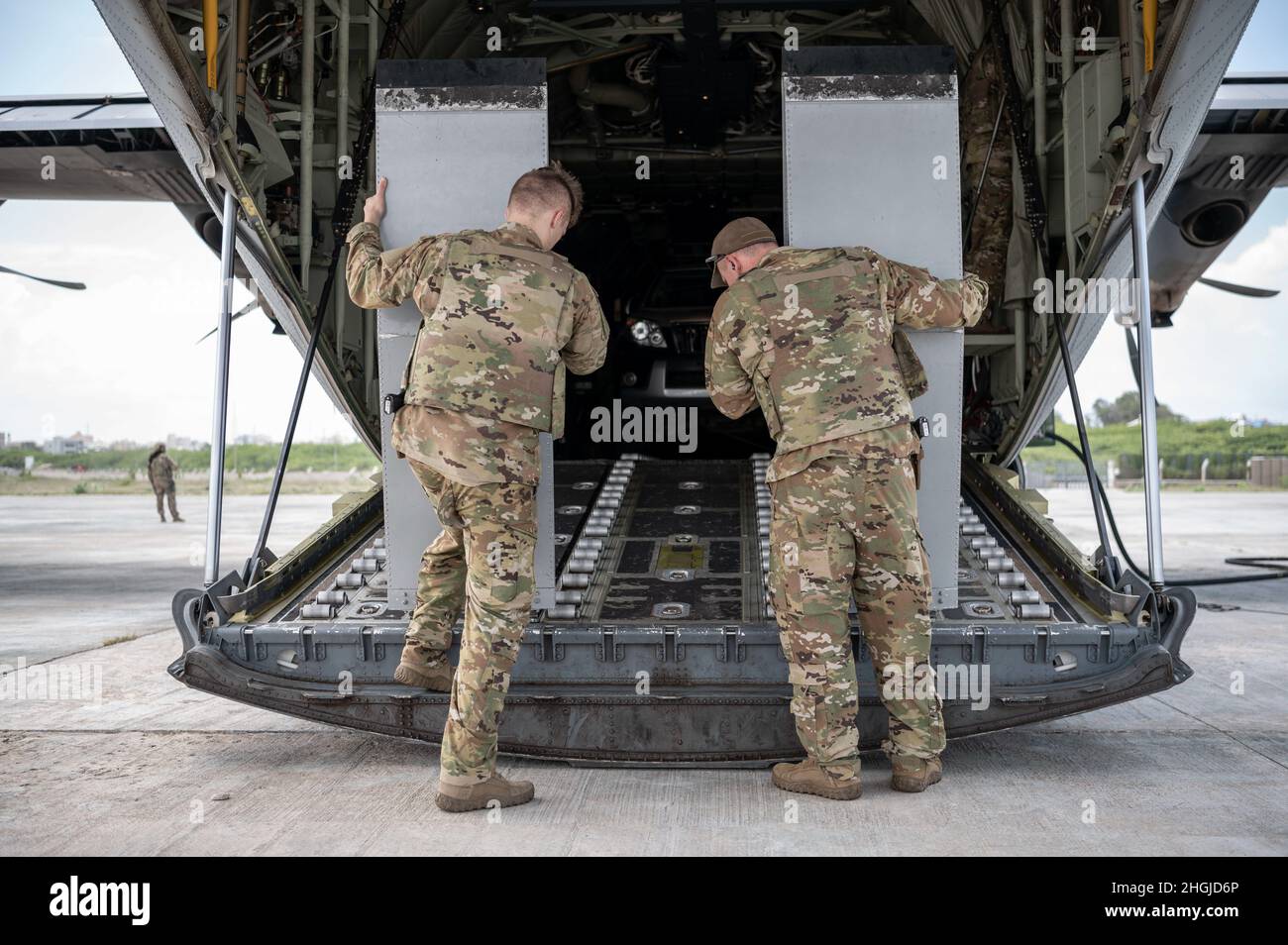 Senior Airman Ryne Whitehead and Airman 1st Class Gage Henderson, C ...