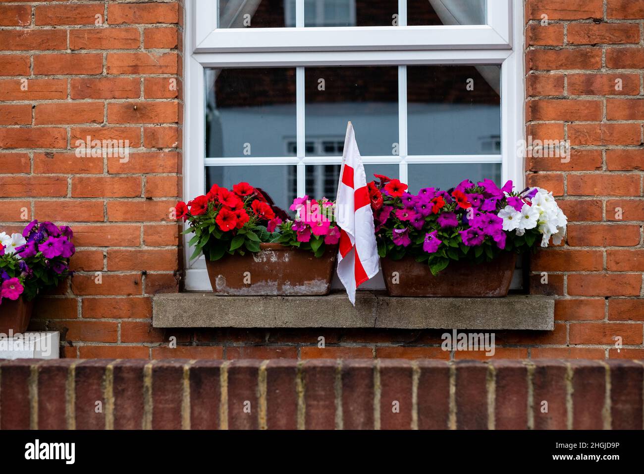 Window box in England with Saint George's flag Stock Photo - Alamy
