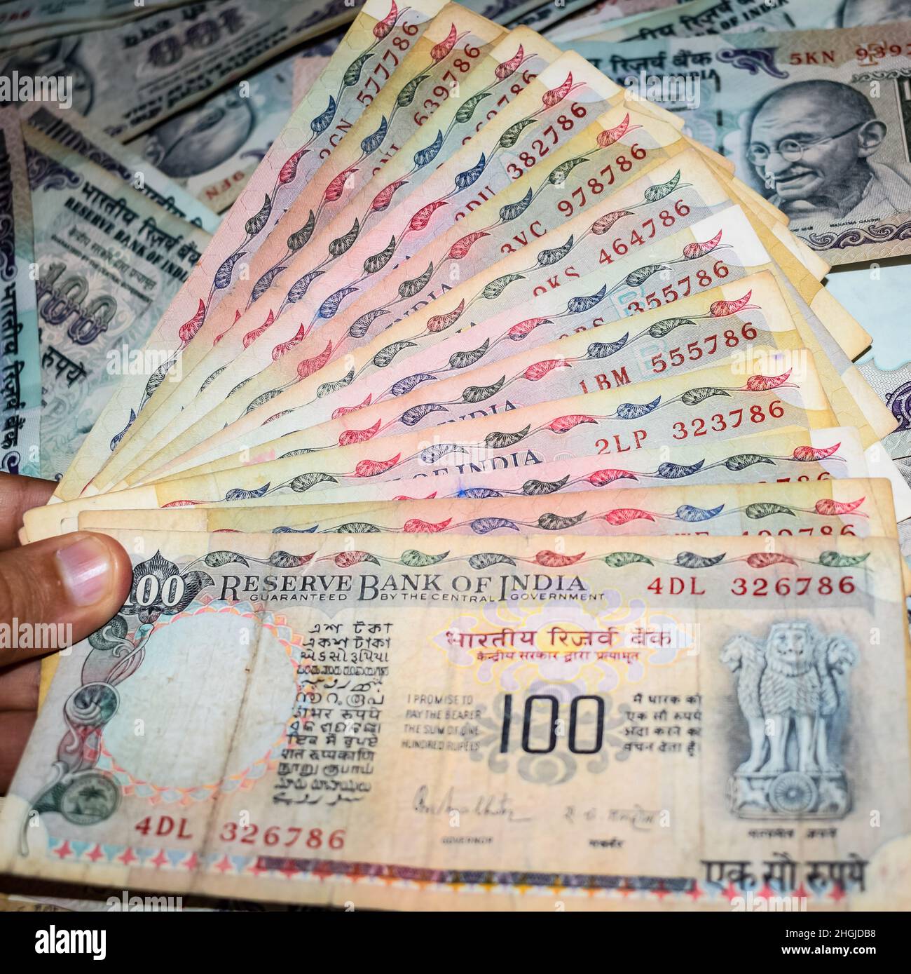 Old One Hundred Rupee notes combined on the table, India money on the ...