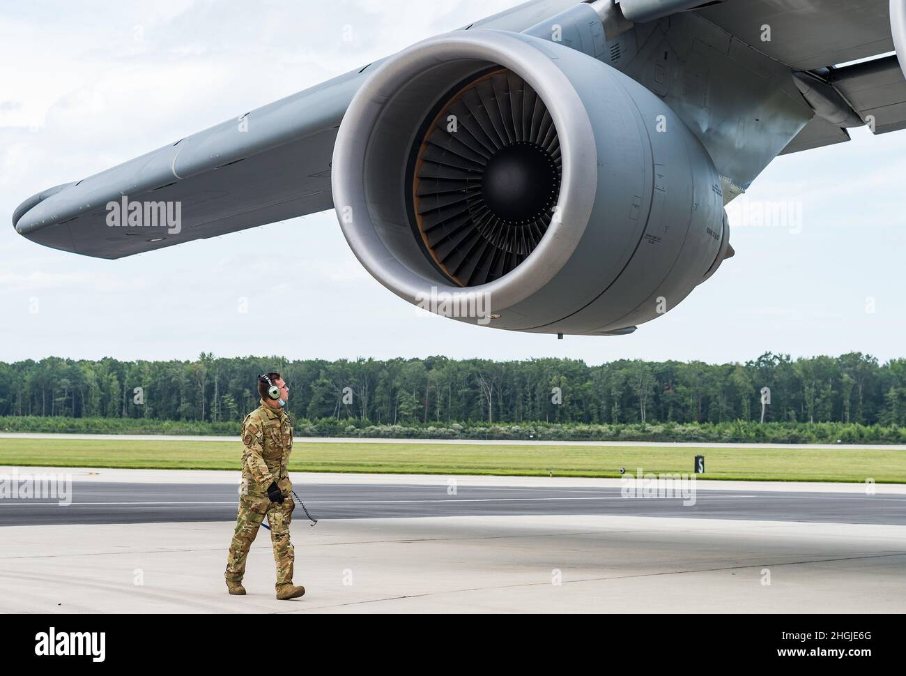 Staff Sgt. Broden McDonald, 9th Airlift Squadron flight engineer, looks ...