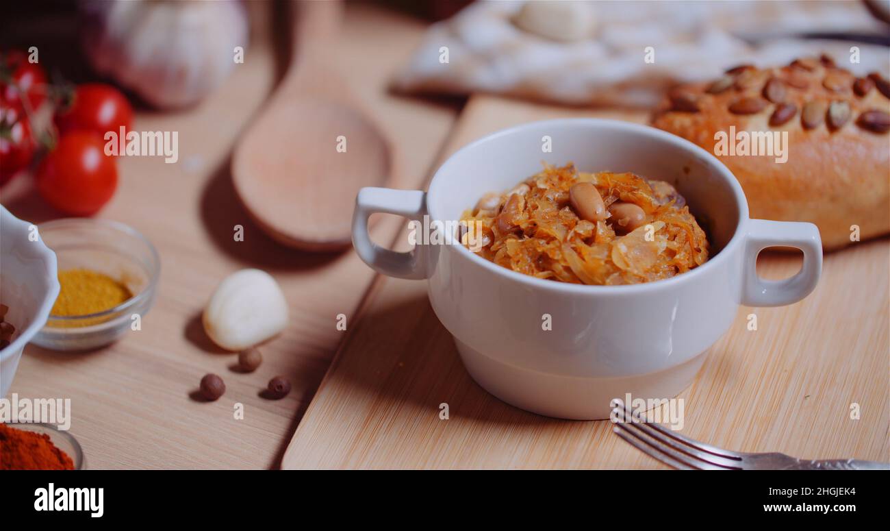 Fresh Food Ingredients On Wooden Table In Kitchen Stock Photo - Alamy