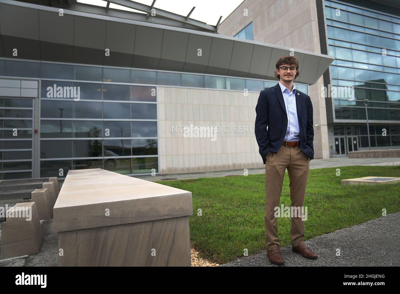 Ethan Marshall, U.S. Air Force Premier College Intern, stands near the ...