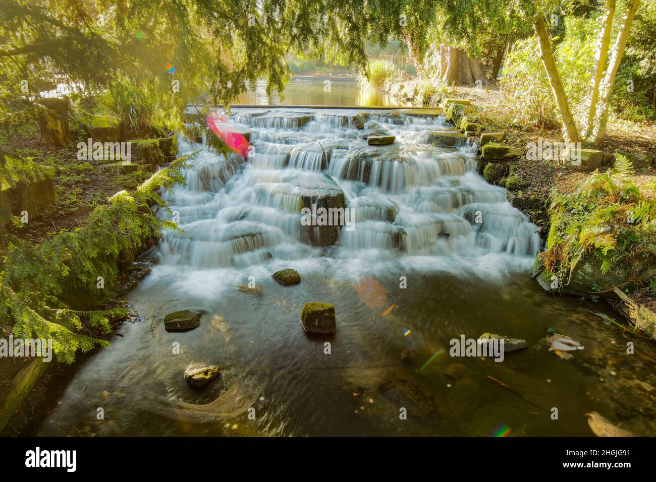 Intimate landscape of the River Wandle water falling in Grove Park ...