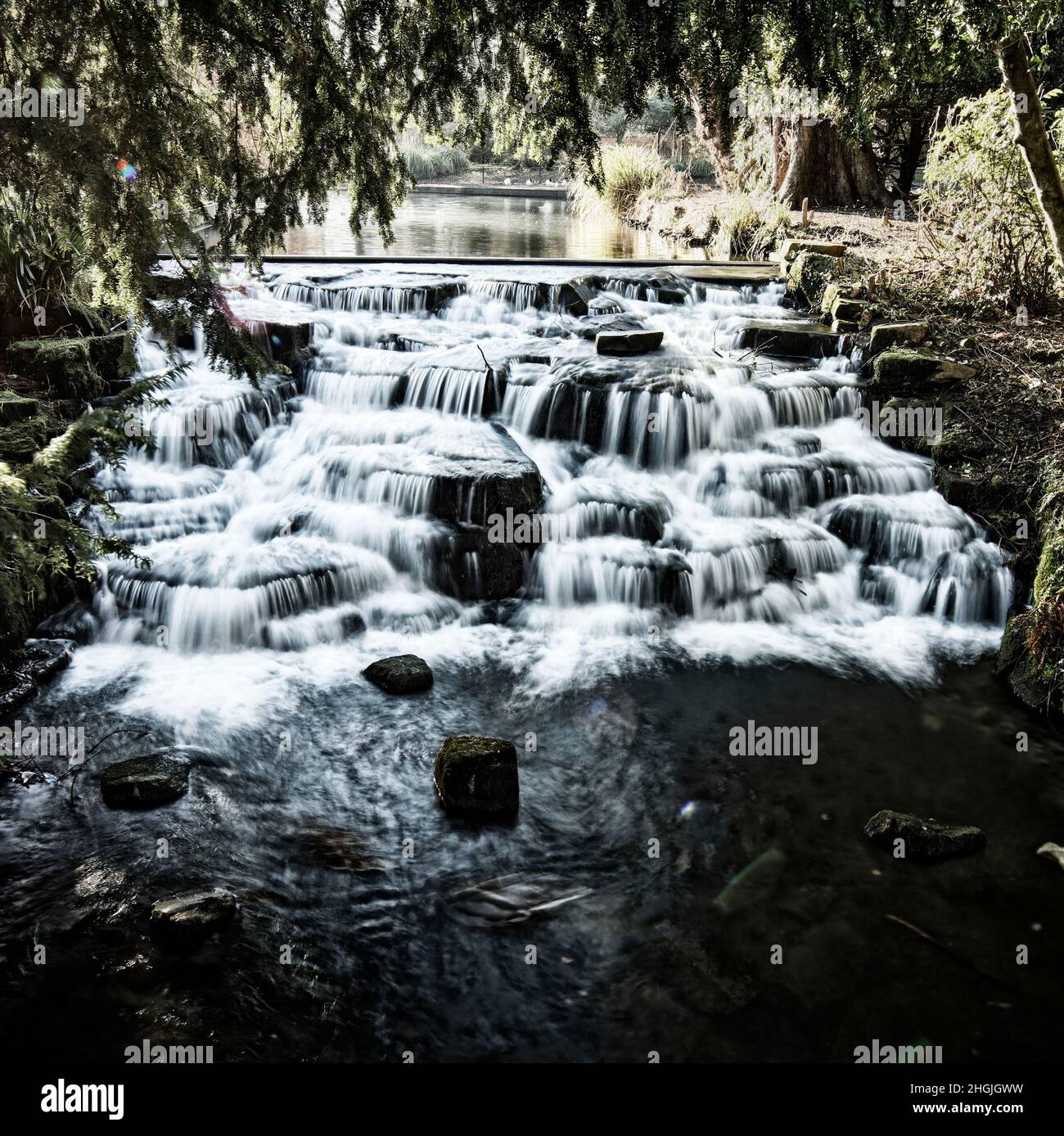 Intimate landscape of the River Wandle water falling in Grove Park ...