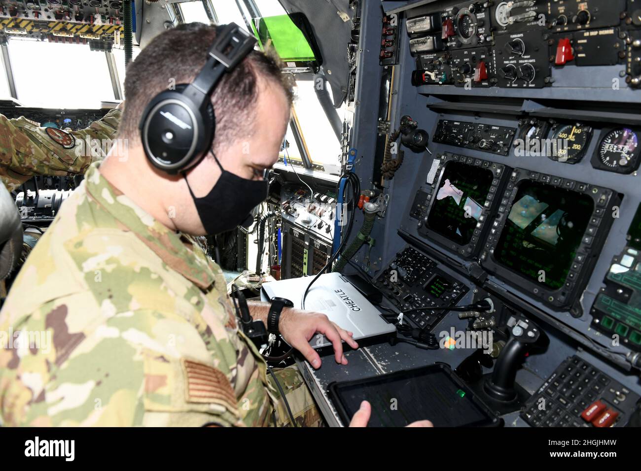 Capt. Andrew Cheatle, 15th Special Operations Squadron navigator, does ...