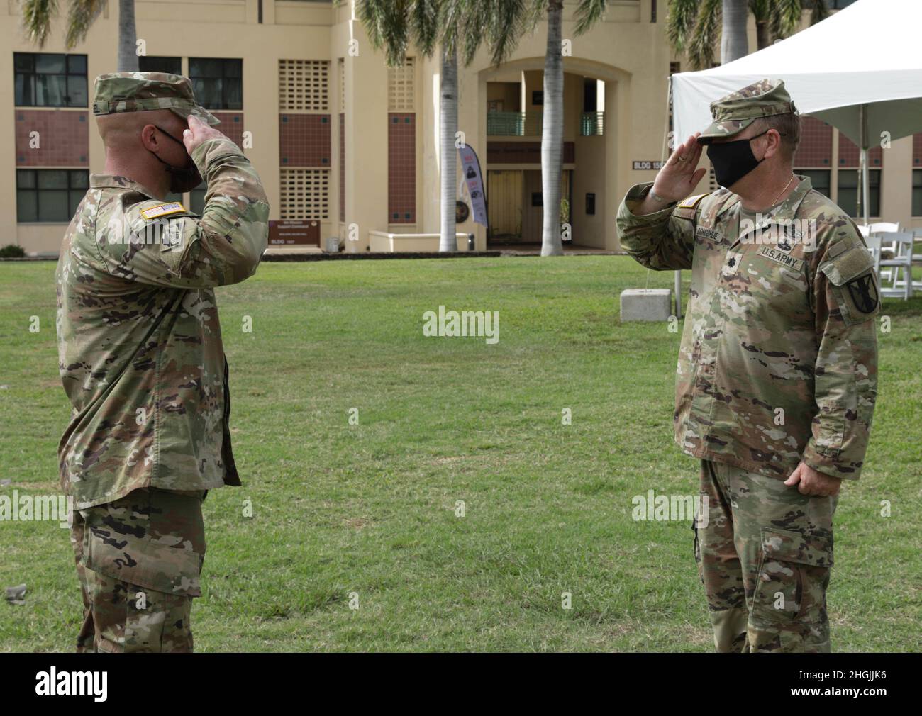 U.S. Army Reserve Command Sgt. Maj. Joshua Engel renders a salute to ...