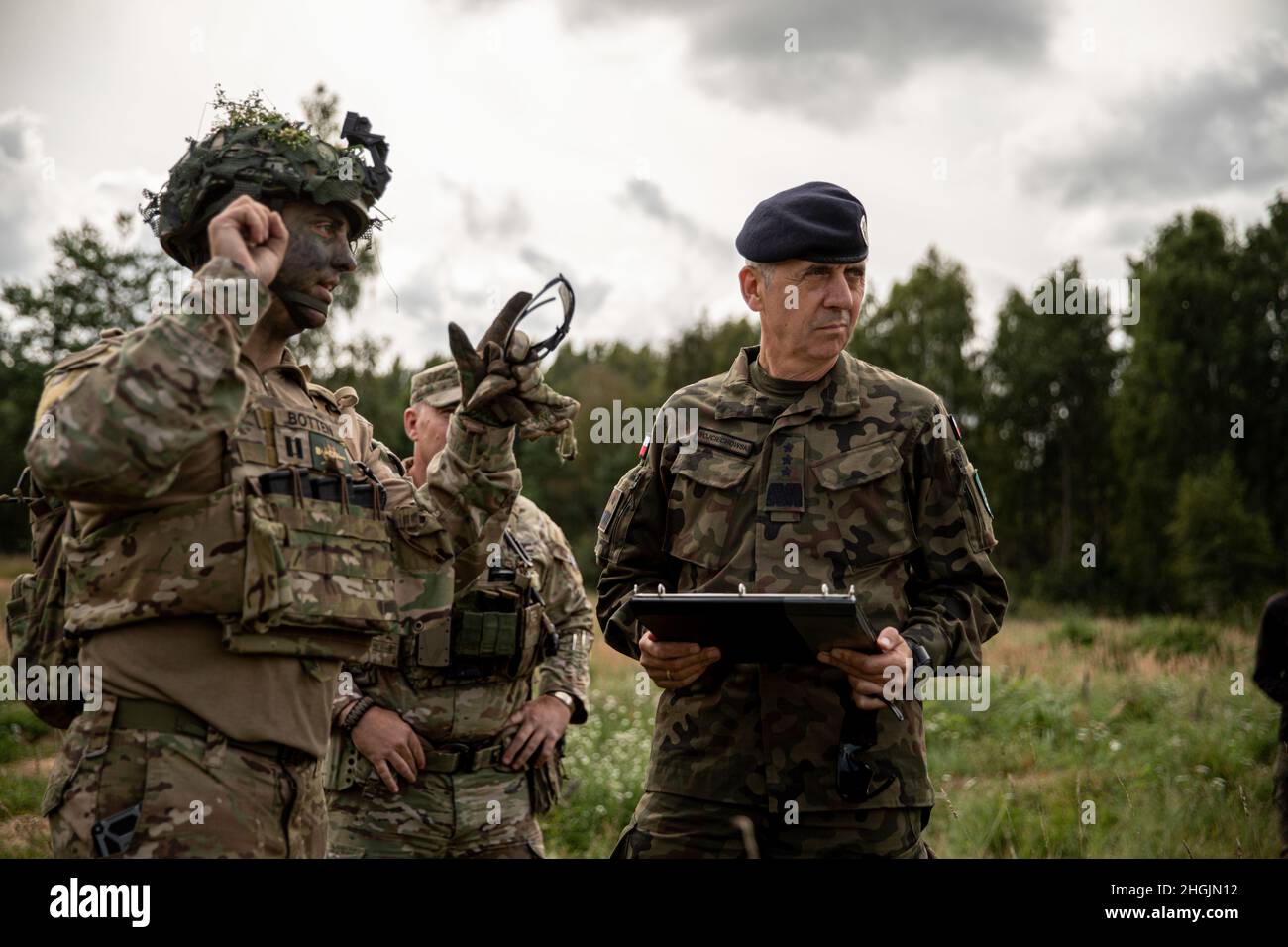 From left, U.S. Army National Guard Capt. Trey Botten from 3rd ...