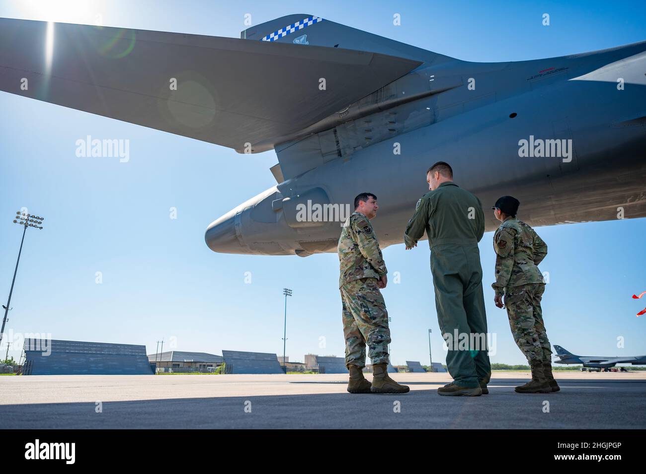 Lt. Col. Nathan Jenkins, 9th Bomb Squadron commander, center, briefs ...