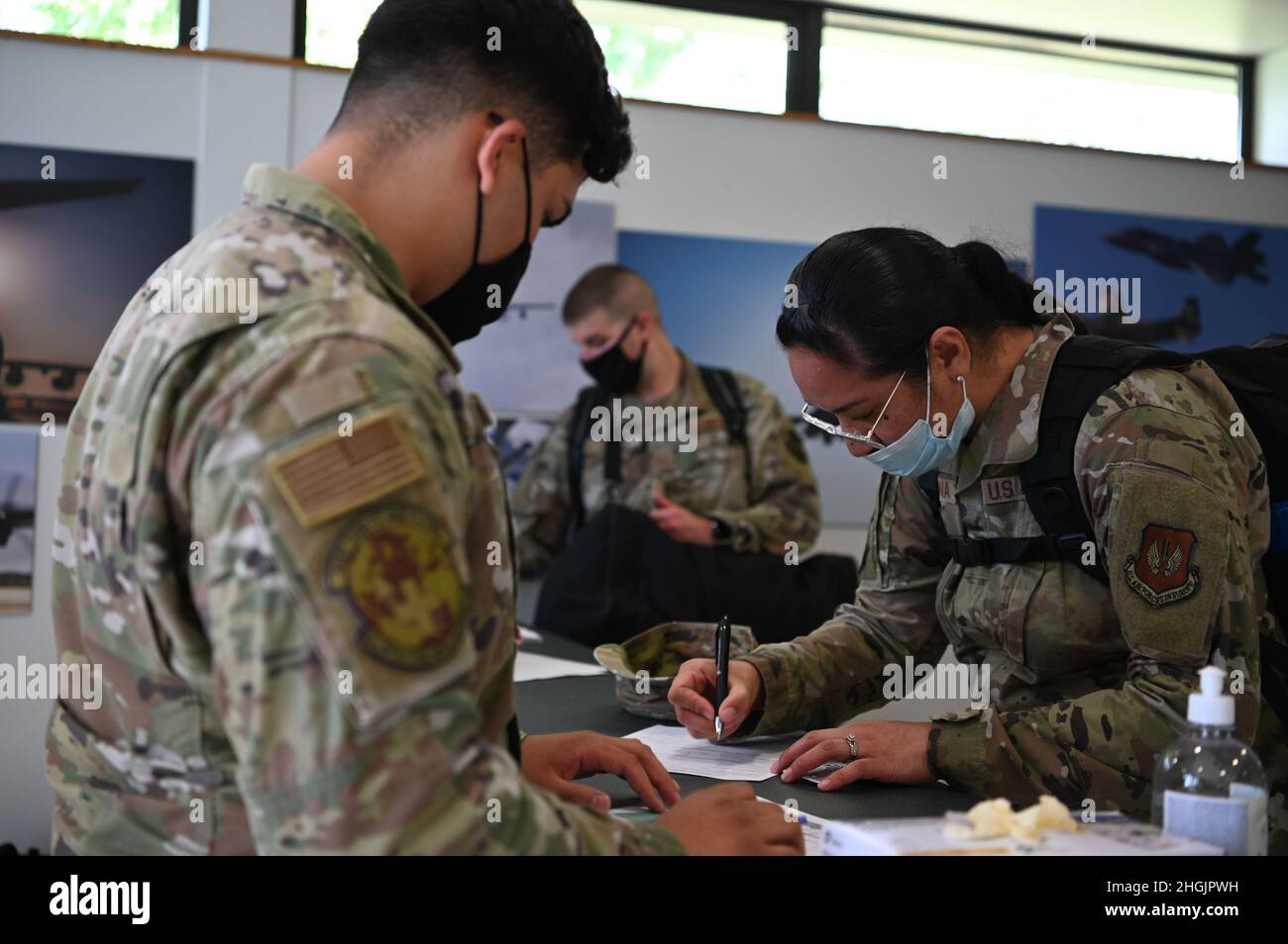A U.S. Air Force Airman from the 48th Medical Group out processes ...