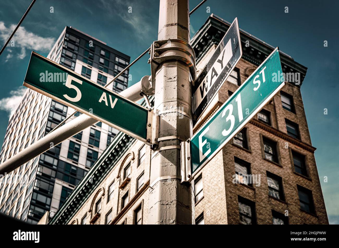 Green Fifth Ave 5th Ave, New York City sign, view from low angle with ...
