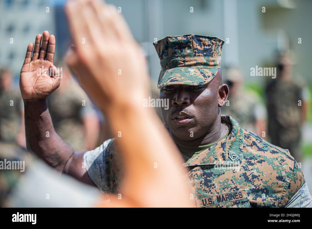 U.S. Marine Corps Gunnery Sgt. Christian Hutson, a faculty advisor at ...