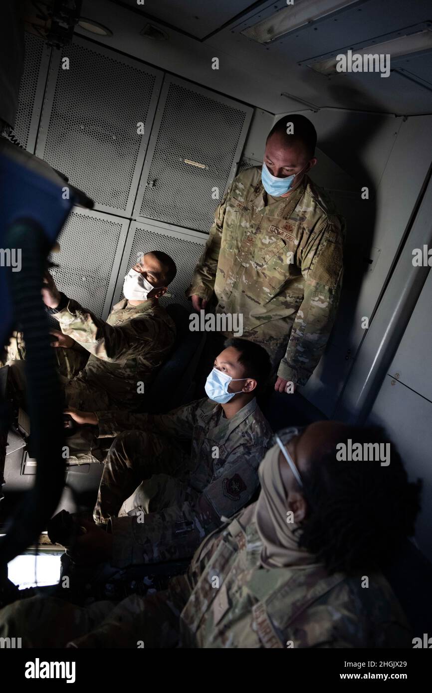 U.S. Air Force Tech. Sgt. Mathew Smith, center, 60th Maintenance Group ...