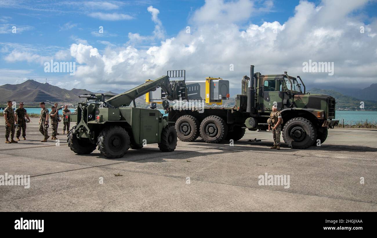 U.S. Marines with 1st Battalion, 12th Marine Regiment offload a Naval ...