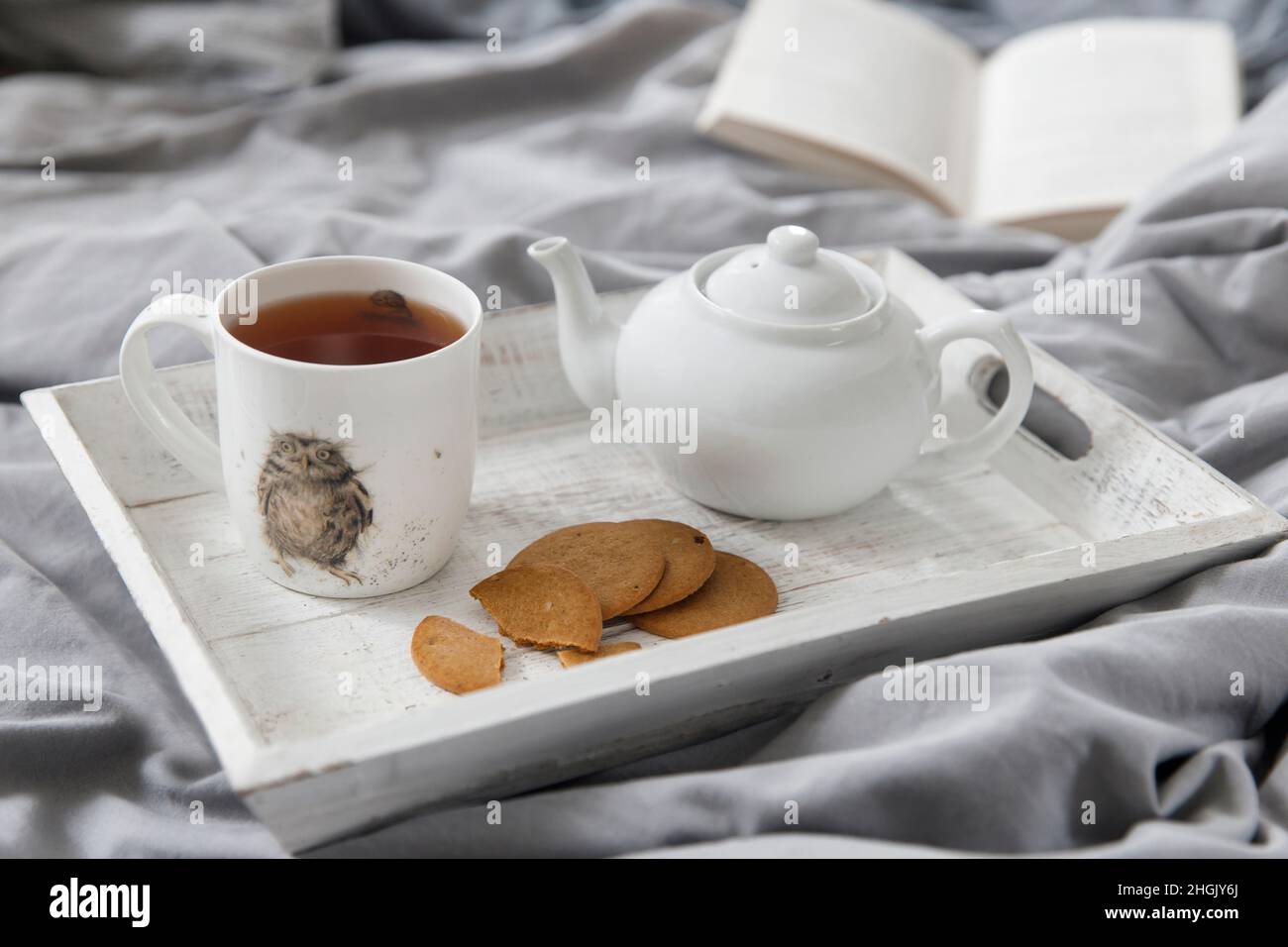 interior and home coziness concept. Top view. A cup of tea, a teapot ...