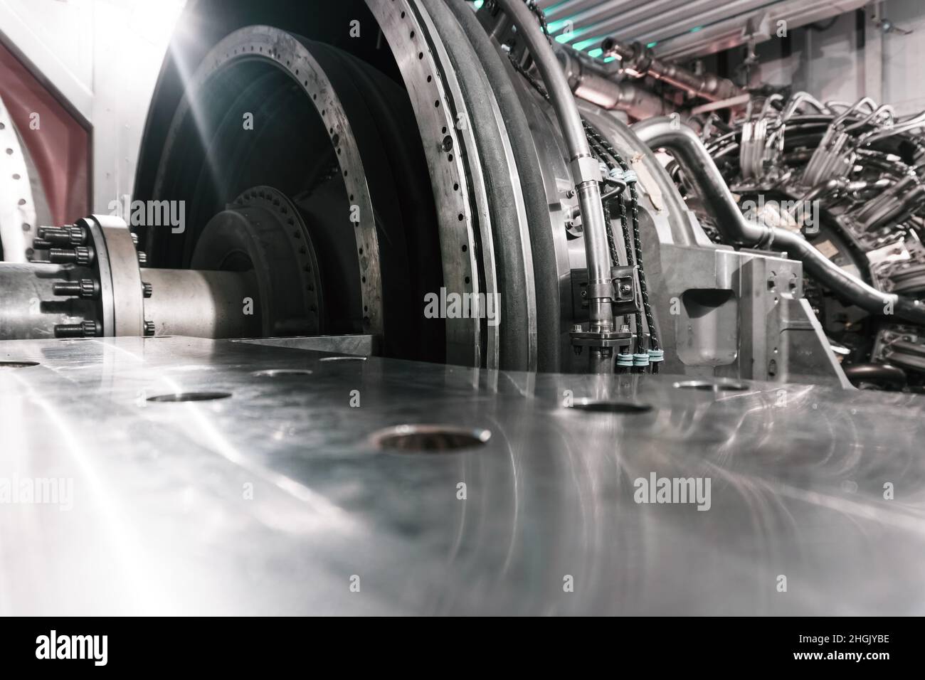 The rotor of a gas turbine compressor with a bolted coupling half ...