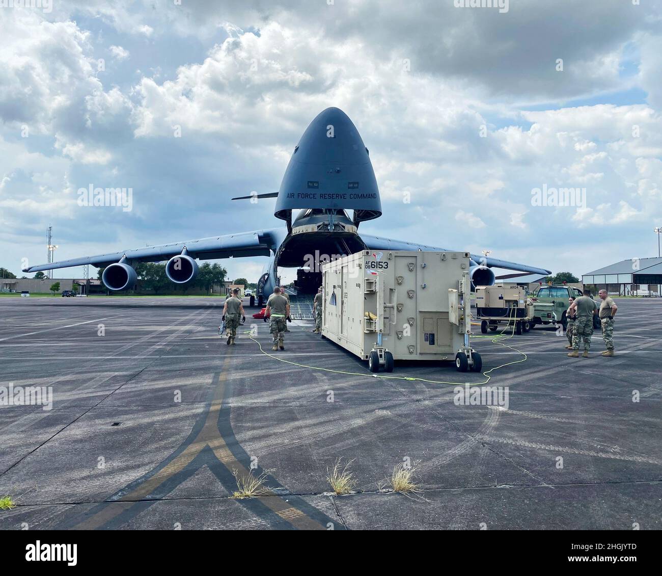 Members of the 147th Attack Wing prepare to load a ground control ...