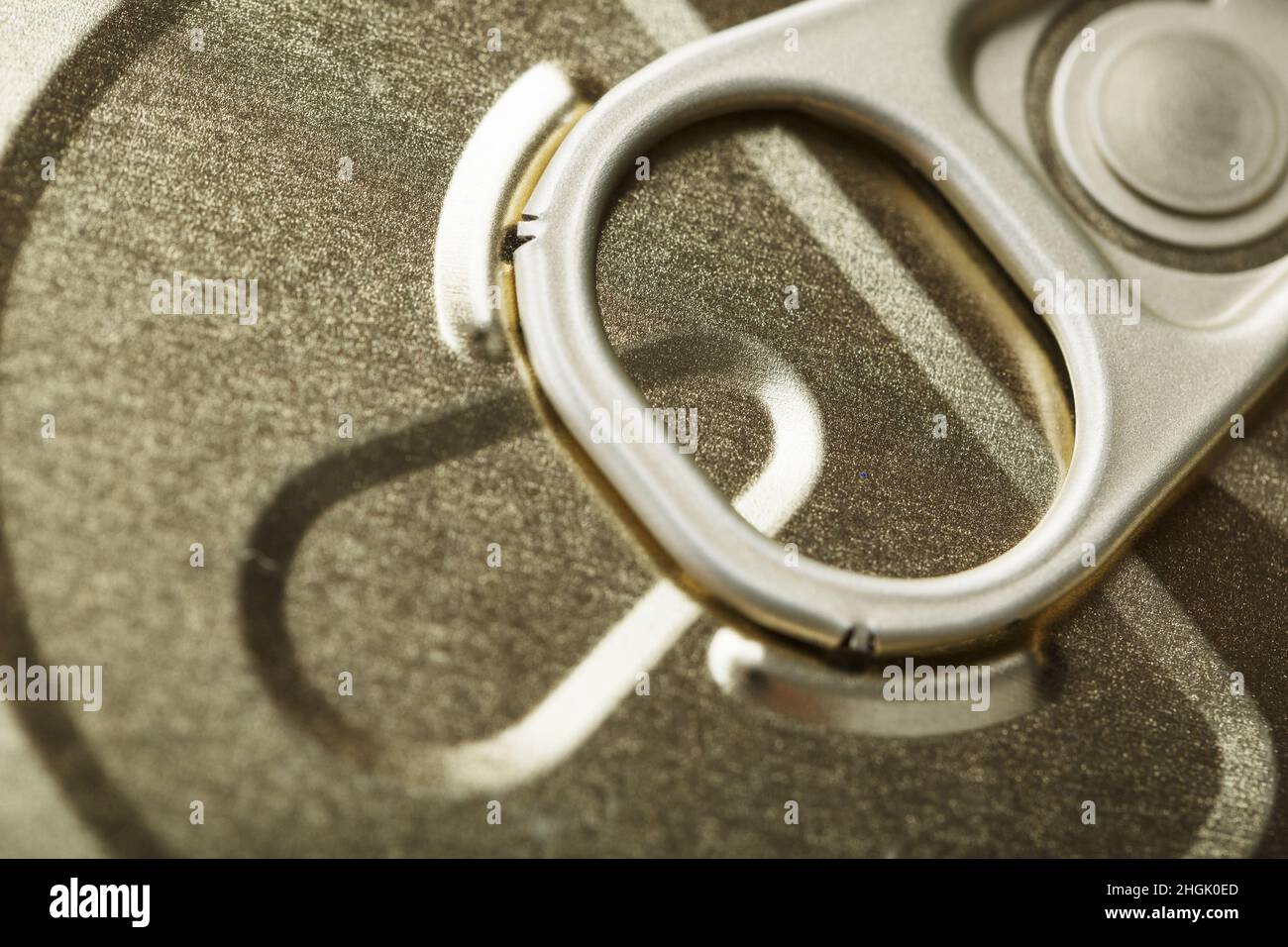 Metal lid with a ring from a tin can Top view, close-up Stock Photo - Alamy