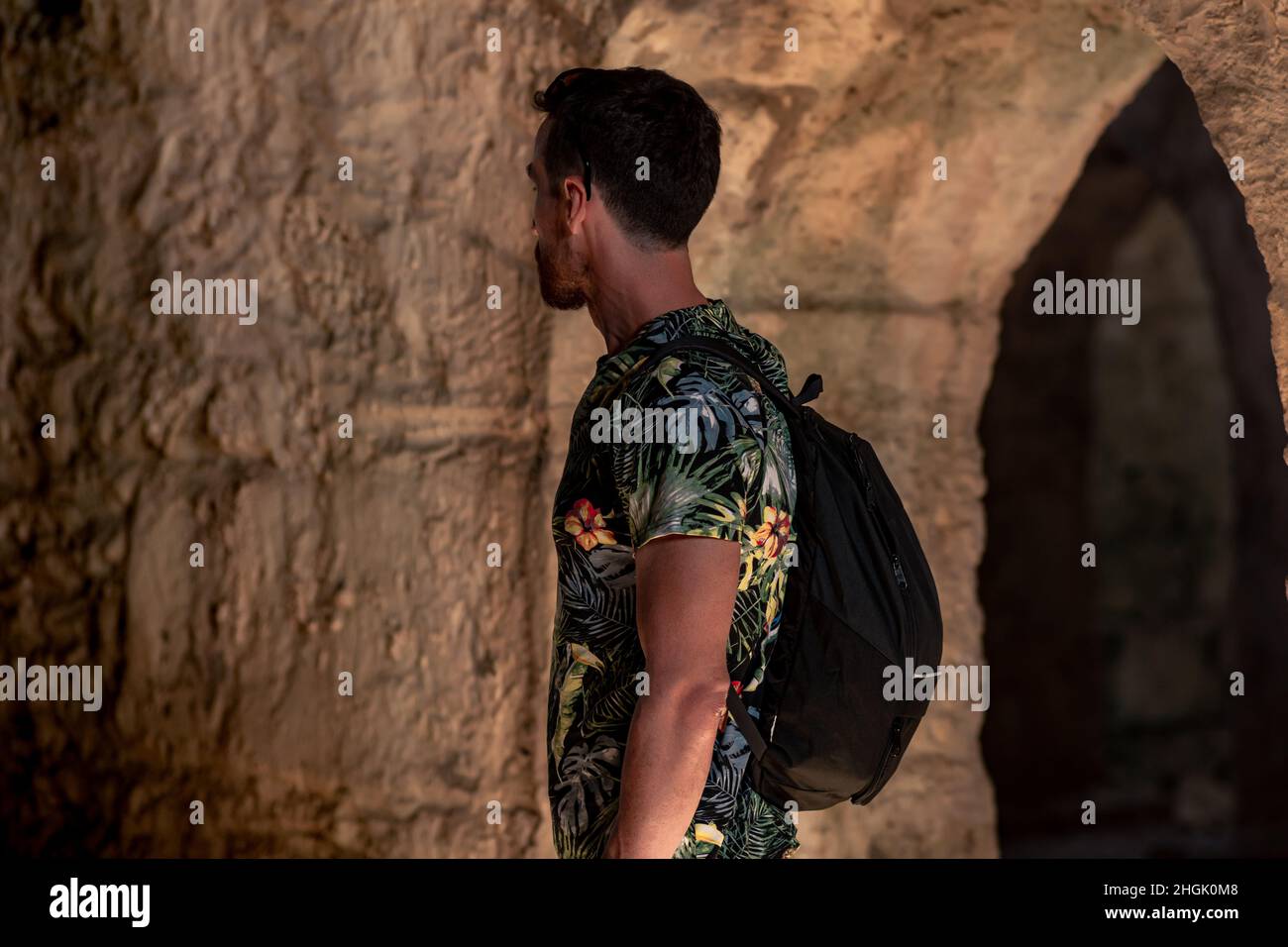 tourist visiting the dungeon of some ancient ruins Stock Photo - Alamy