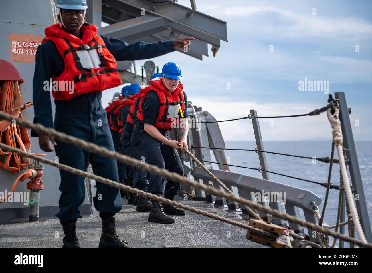 210826-N-MR124-1120 SOUTH CHINA SEA (Aug. 26, 2021) Sailors aboard ...