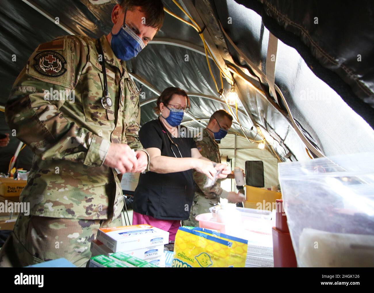 (From left) U.S. Air Force Capt. Justin Keller, registered nurse, 48th ...