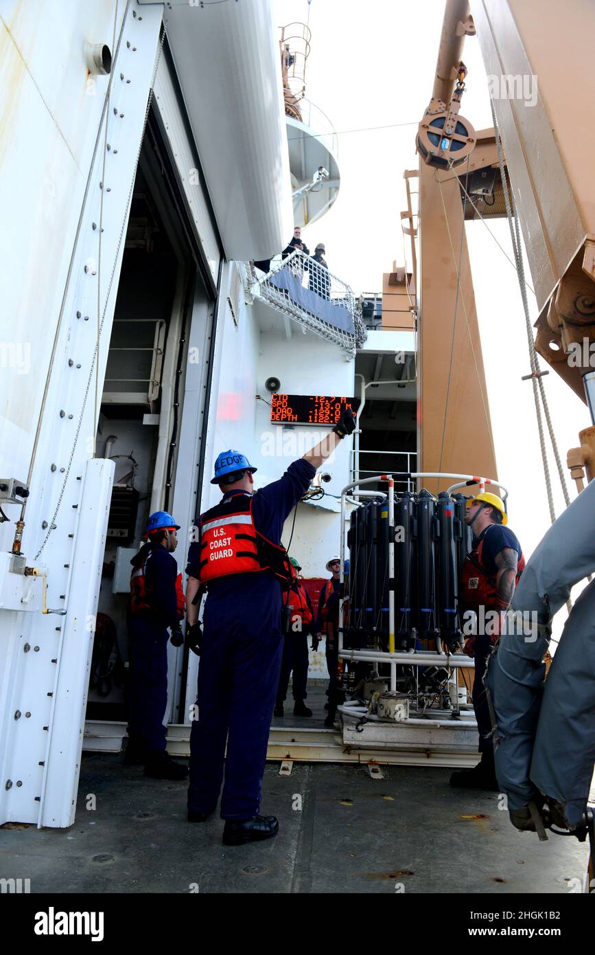 Coast Guard Cutter Healy (WAGB 20) crewmembers prepare a Conductivity ...