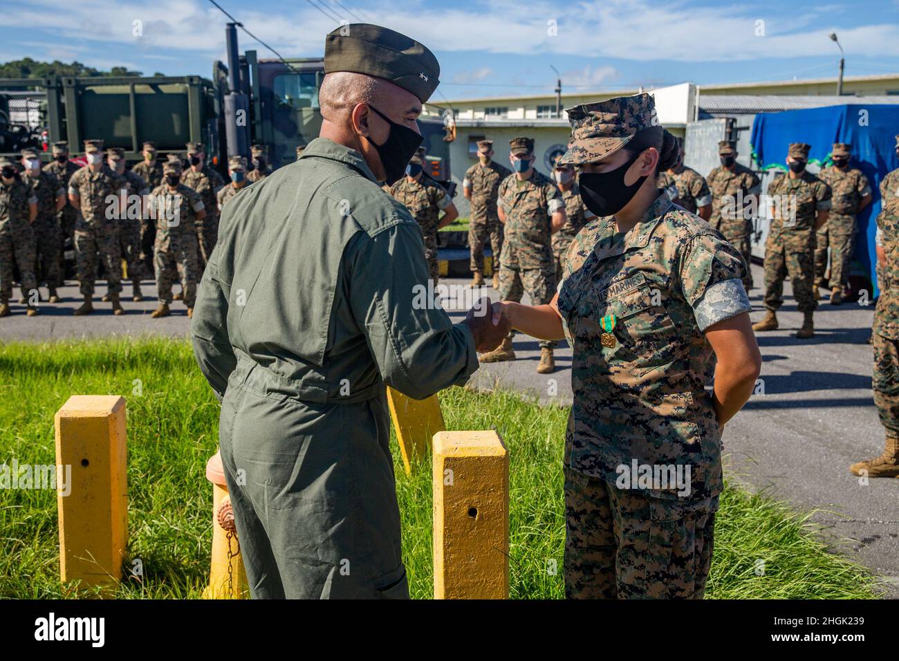 U.S. Marine Corps Maj. Gen. Brian Cavanaugh (left), Commanding General ...