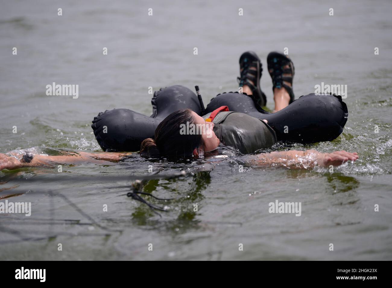 A Soldier from the 3rd Special Forces Group (Airborne) floats in the ...