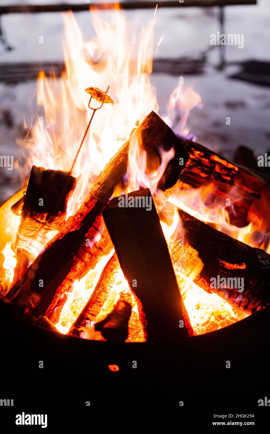 blazing fire in hearth at night close up Stock Photo - Alamy