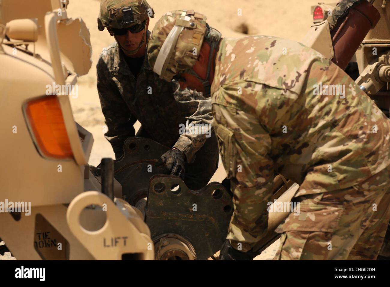 Sgt. 1st Class Timothy Drake and Cpl. Joshua Powell, wheeled vehicle ...