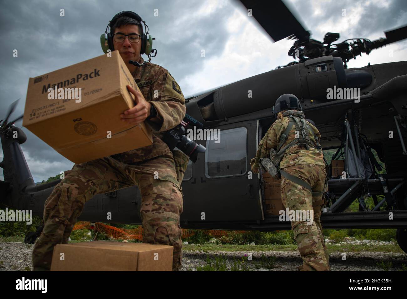 Spc. Adrian Pacheco, an Army combat documentation specialist, with the ...
