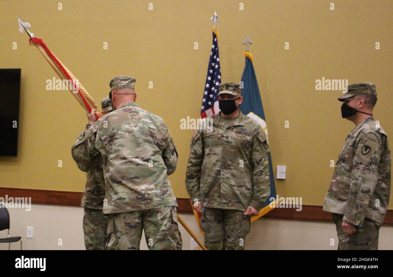 Col. Jessie Griffith accepts the 418th Contracting Support Brigade colors from Brig. Gen ...