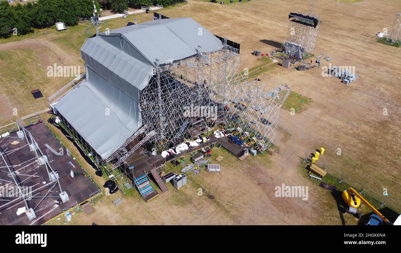 workers build a concert stage. Concept High-rise works. metal designs ...