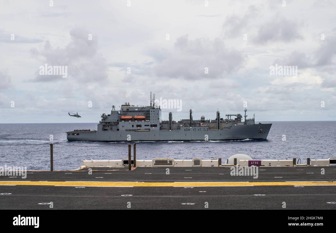 The dry cargo and ammunition ship USNS Matthew Perry (T-AKE 9) sails ...
