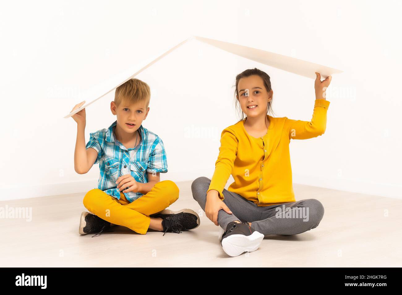 school children with roof on white background, isolated on white ...