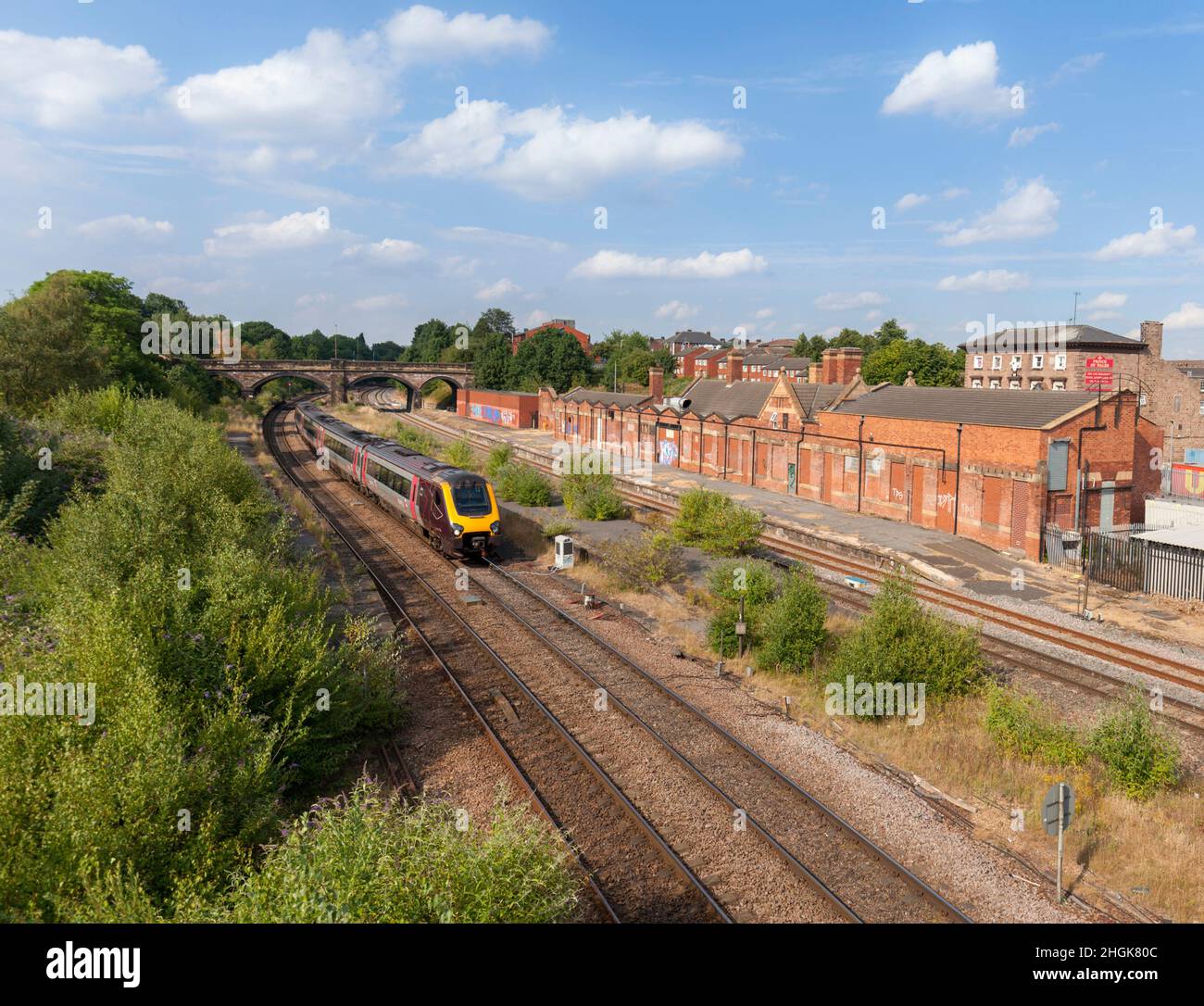 A Crosscountry Trains class 220 voyager train passing the derelict ...