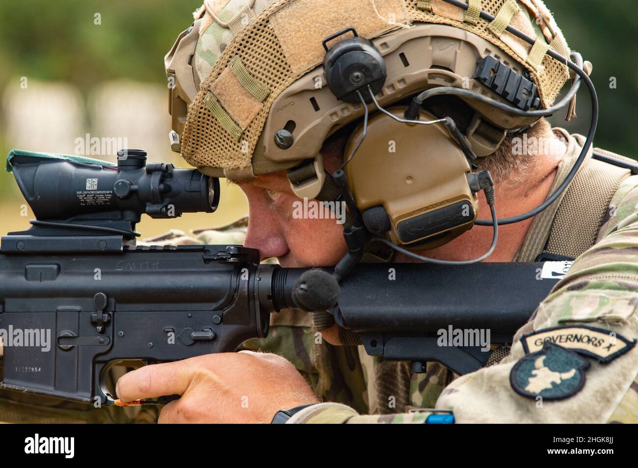 Sgt. Kyle Thies, Iowa National Guard, fires his M-4 rifle during the ...