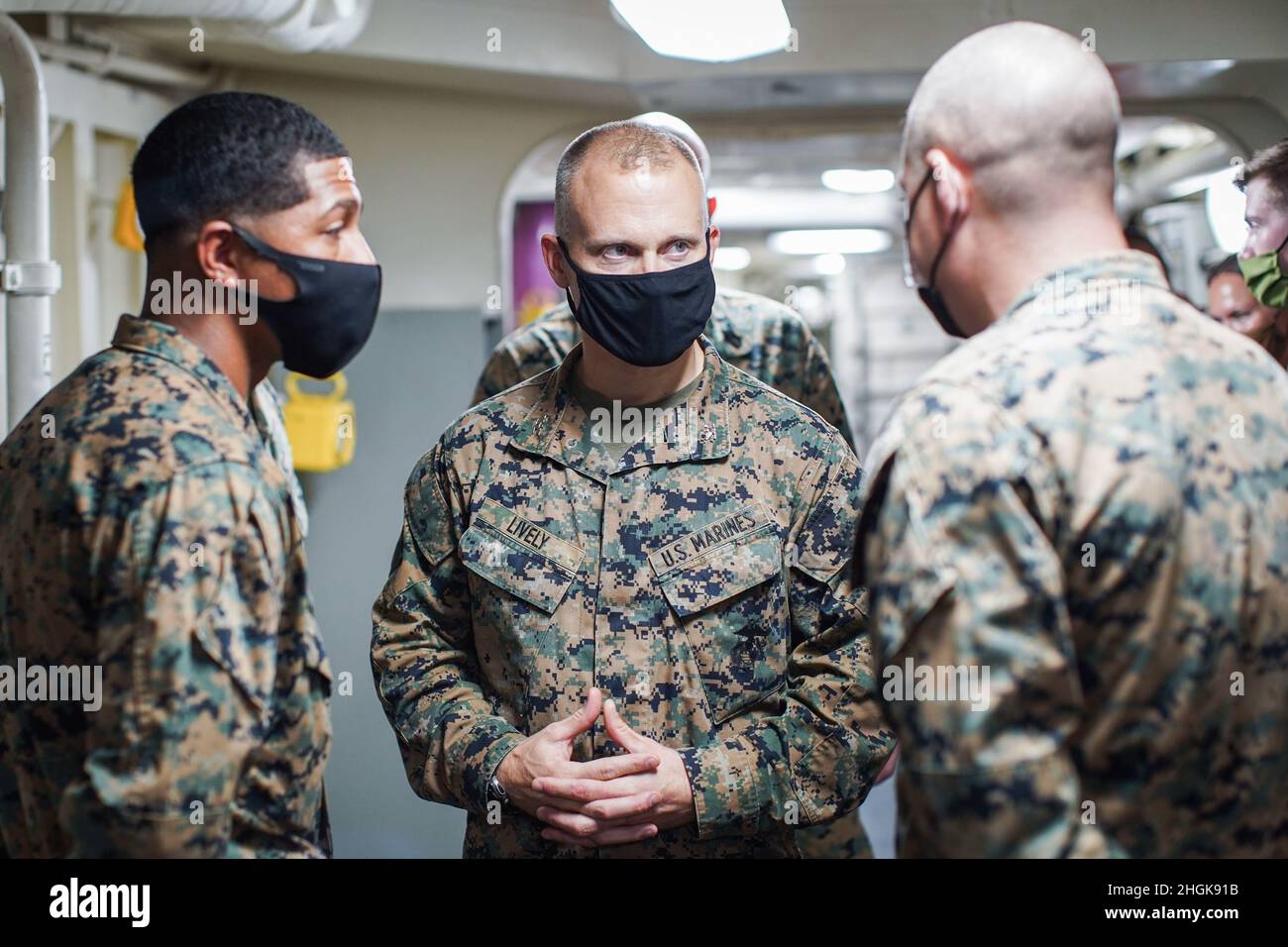 U.S. Marine Corps Col. Jim Lively, center, commanding officer of the ...